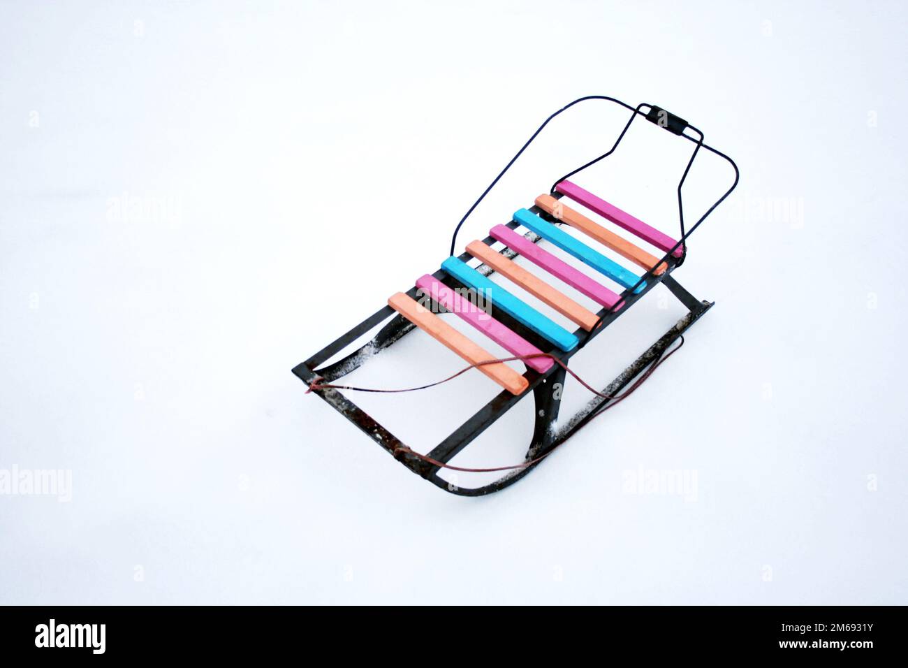 Sledge on the snow. Winters transport of the kids Stock Photo - Alamy