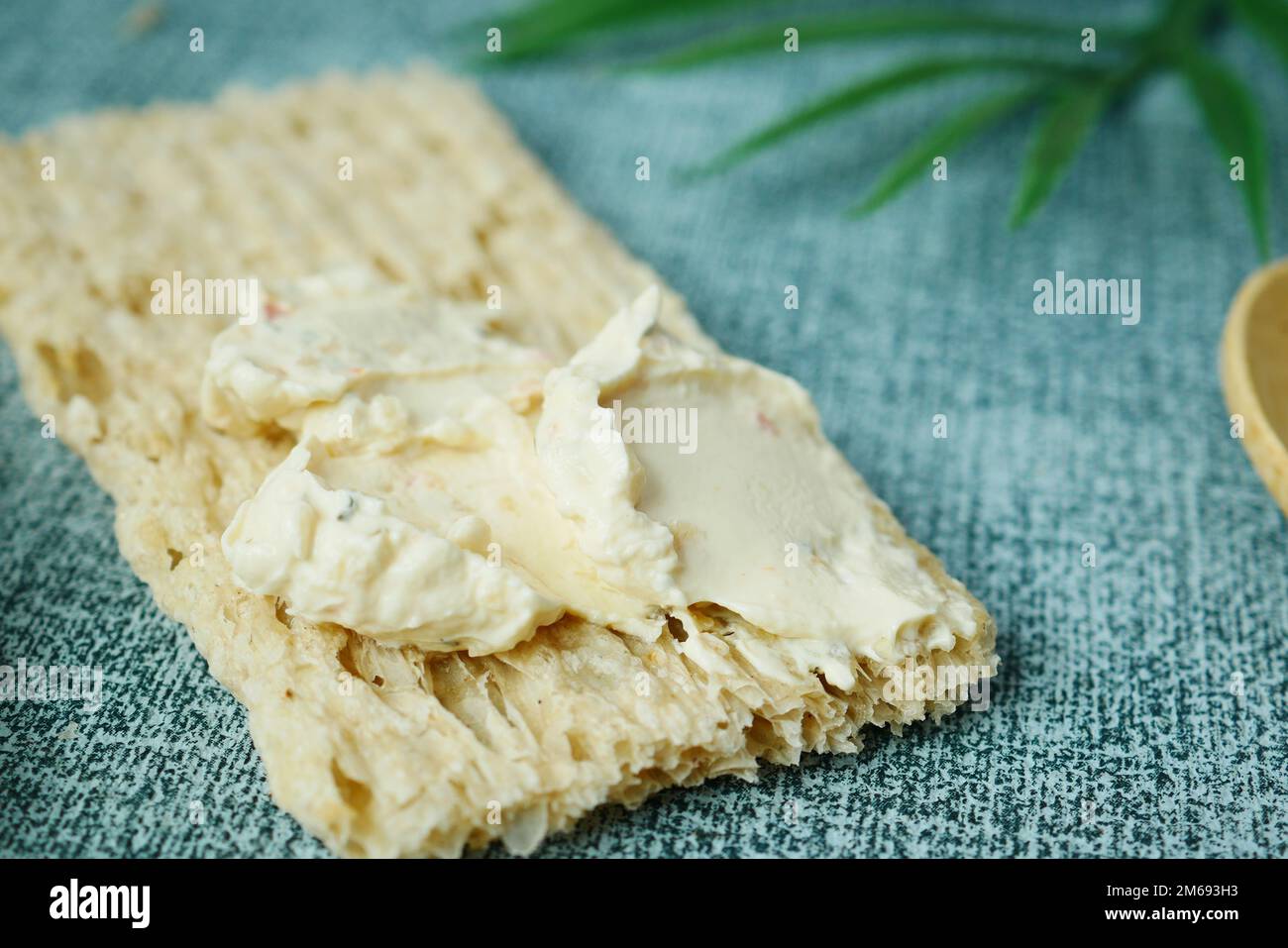 cheese cream spread crackers on table Stock Photo - Alamy