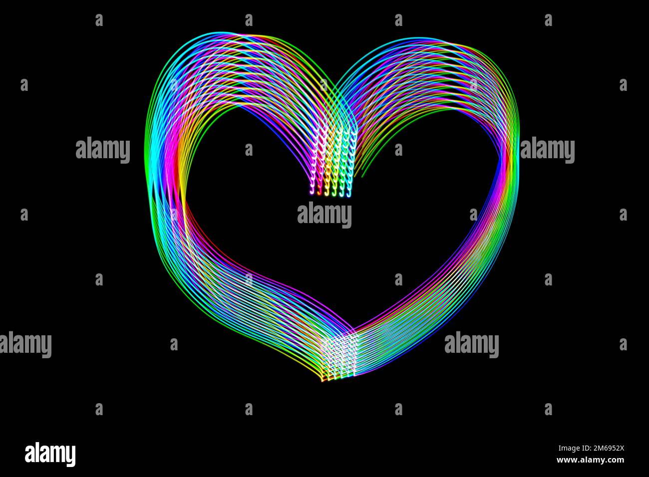 Beautiful light painting designs on dark black background. Long ...