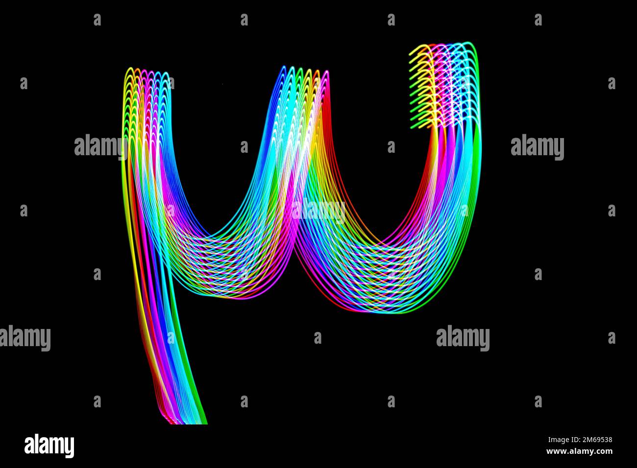 Beautiful light painting designs on dark black background. Long ...