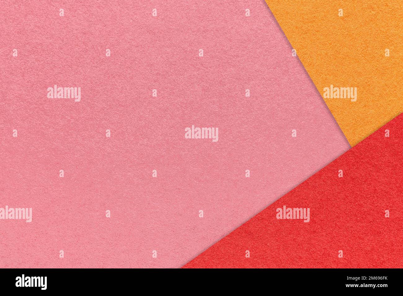 Texture of craft pink color paper background with red and orange border ...