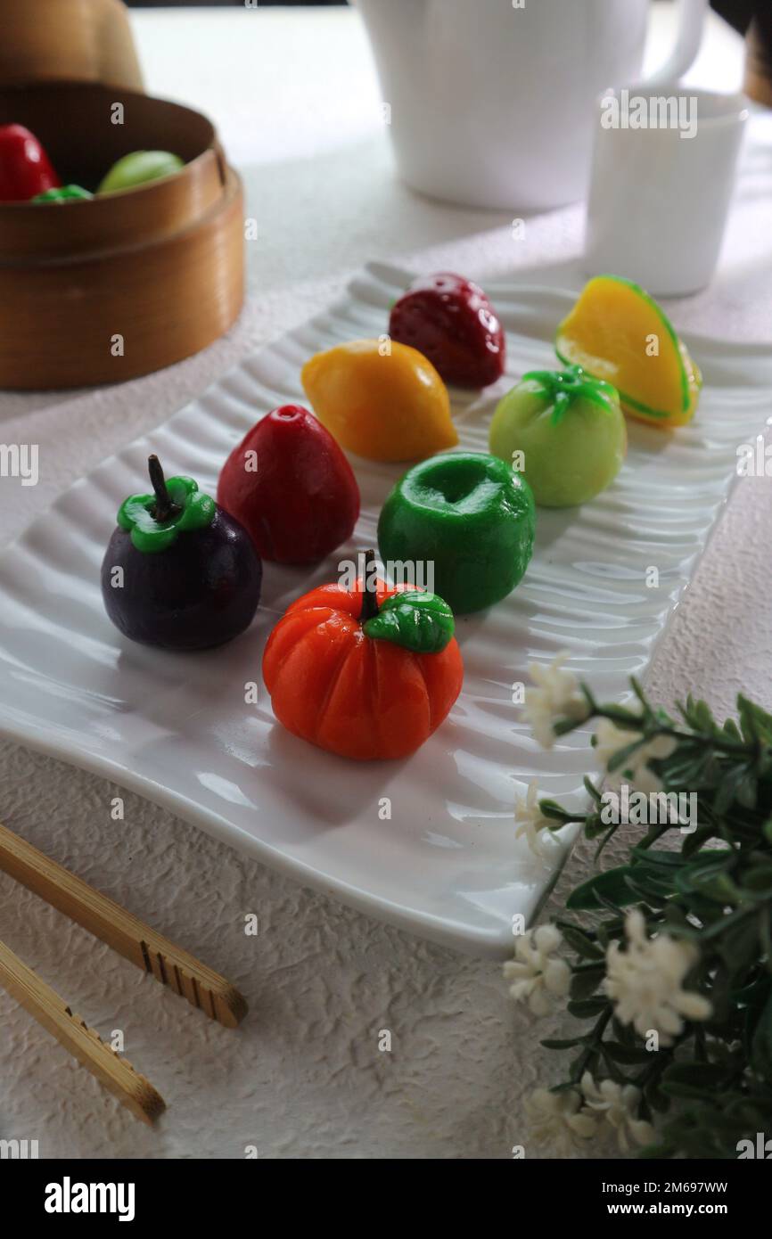 Steamed fruit-shaped cakes filled with delicious green beans Stock ...