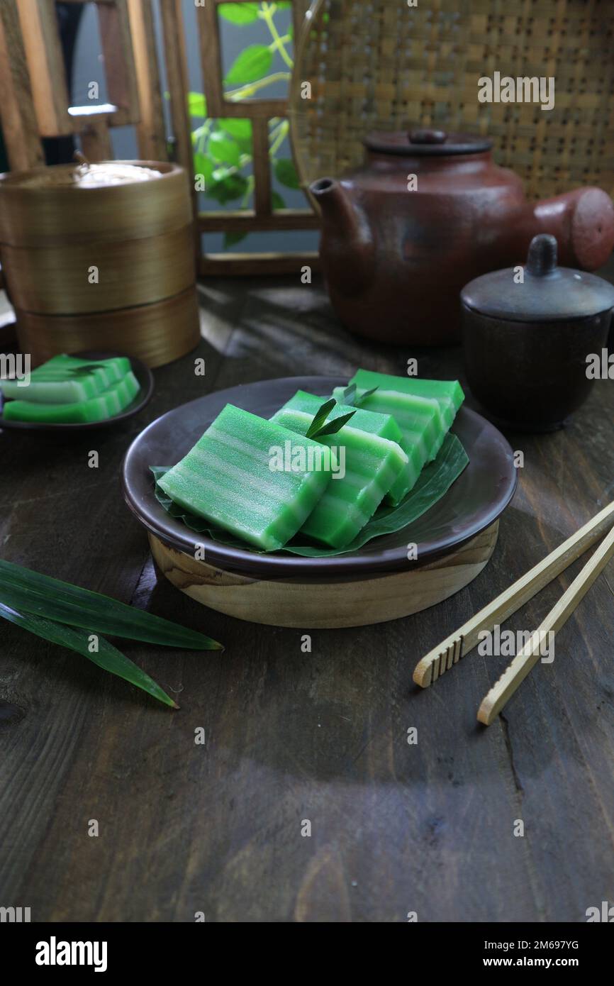 delicious steamed green layer cake Stock Photo - Alamy