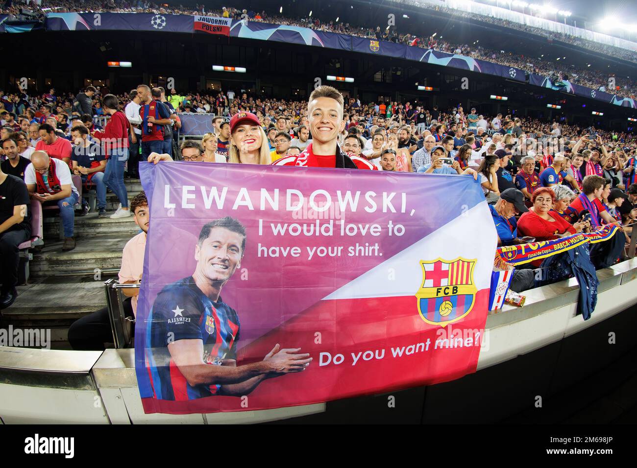 BARCELONA - OCT 26: A fan with a Lewandowski flag during the Champions ...