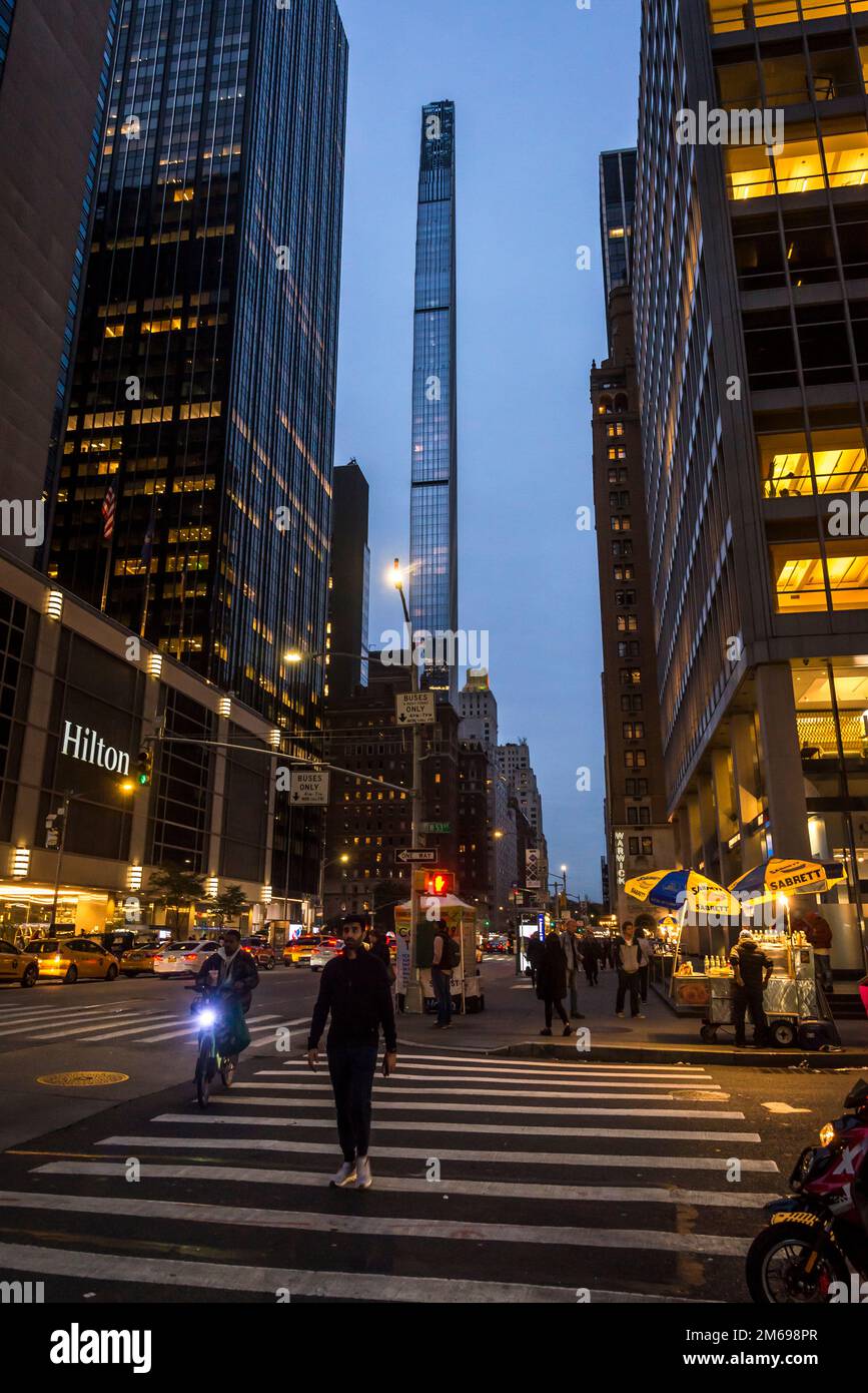 Illuminated skyscrapers 6th Avenue with the new tall and skinny 111 ...