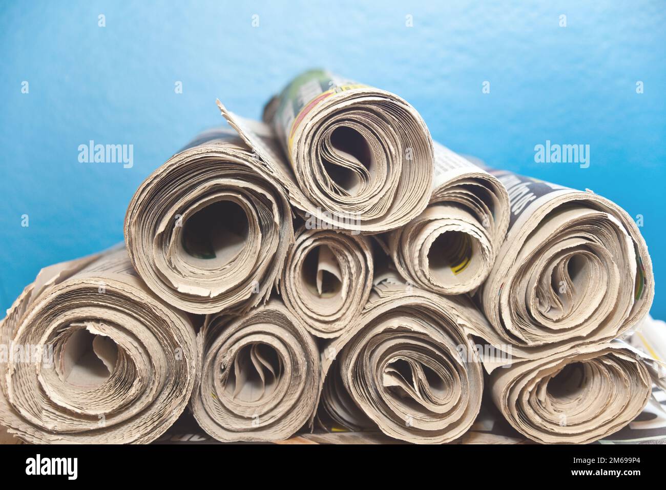 Rolled up newspapers hi-res stock photography and images - Alamy