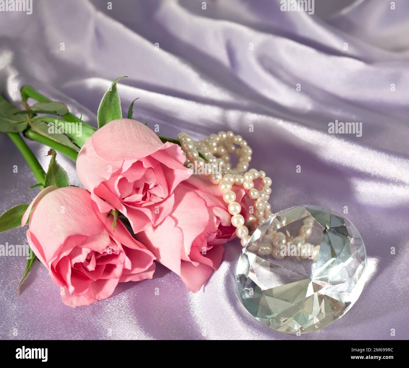 Rosebuds and diamond and pearls Stock Photo - Alamy