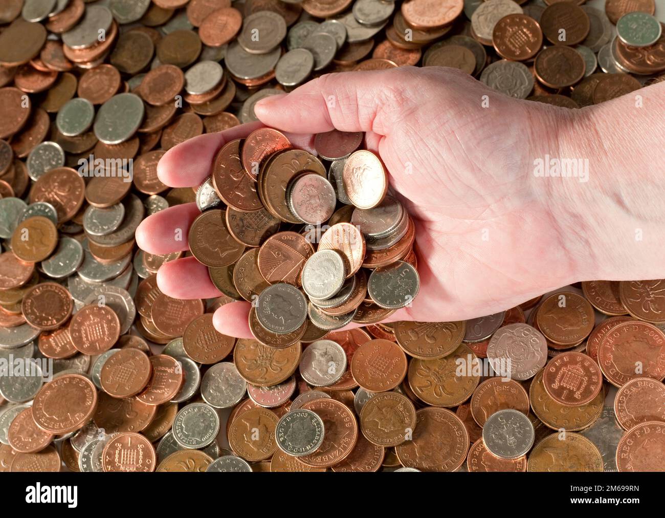 Wealth handfull hi-res stock photography and images - Alamy