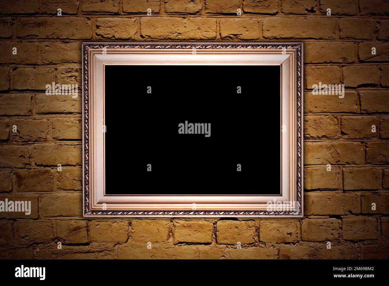 Brick wall with a frame Stock Photo - Alamy