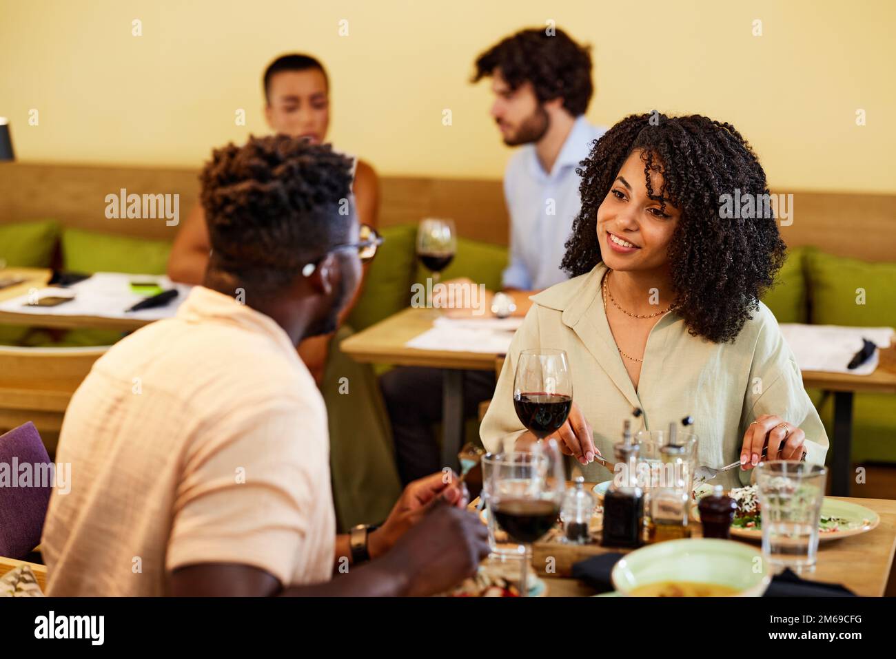Happy interracial couple in celebration hi-res stock photography and ...