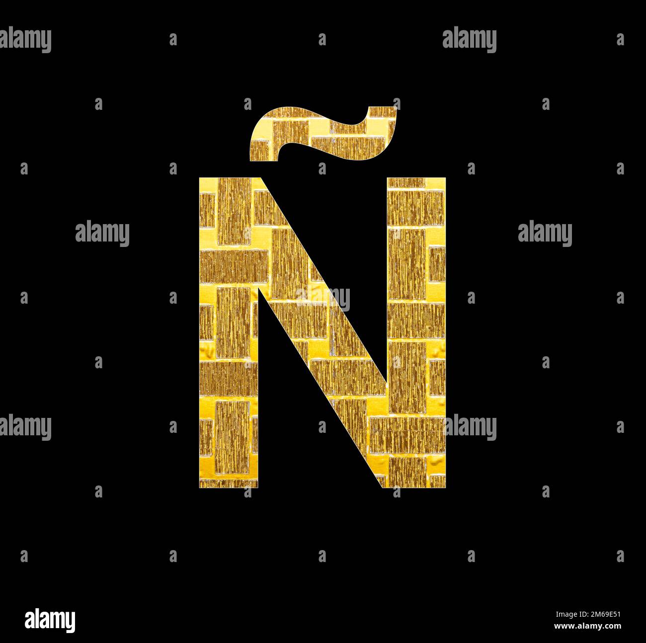 Alphabet letter Ñ - Textured shiny gold foil Stock Photo - Alamy
