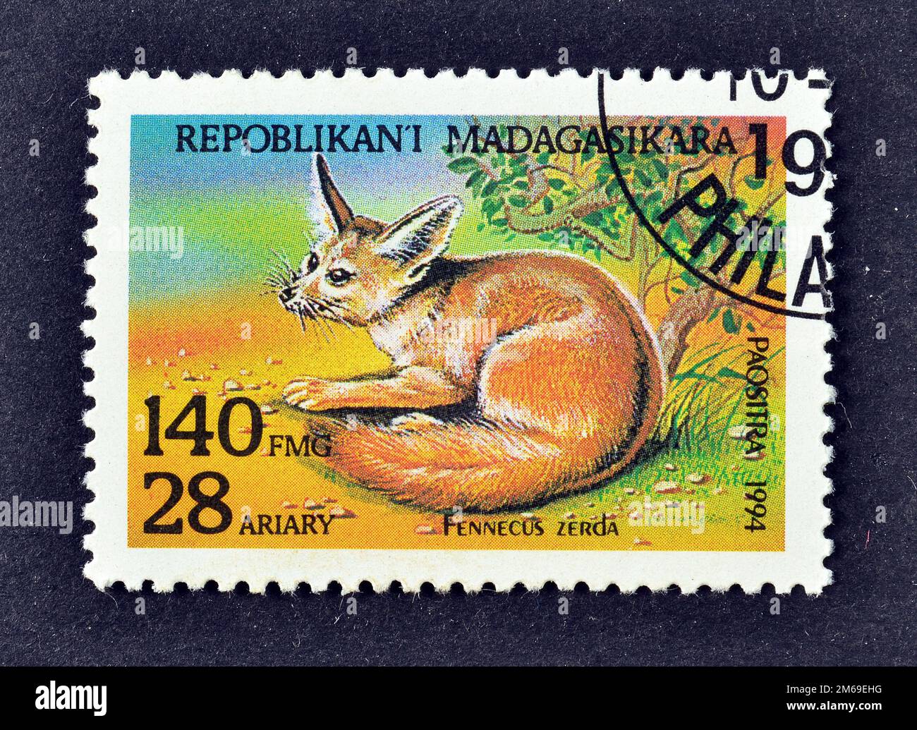 cancelled postage stamp printed by Madagascar, that shows Fennec Fox ...