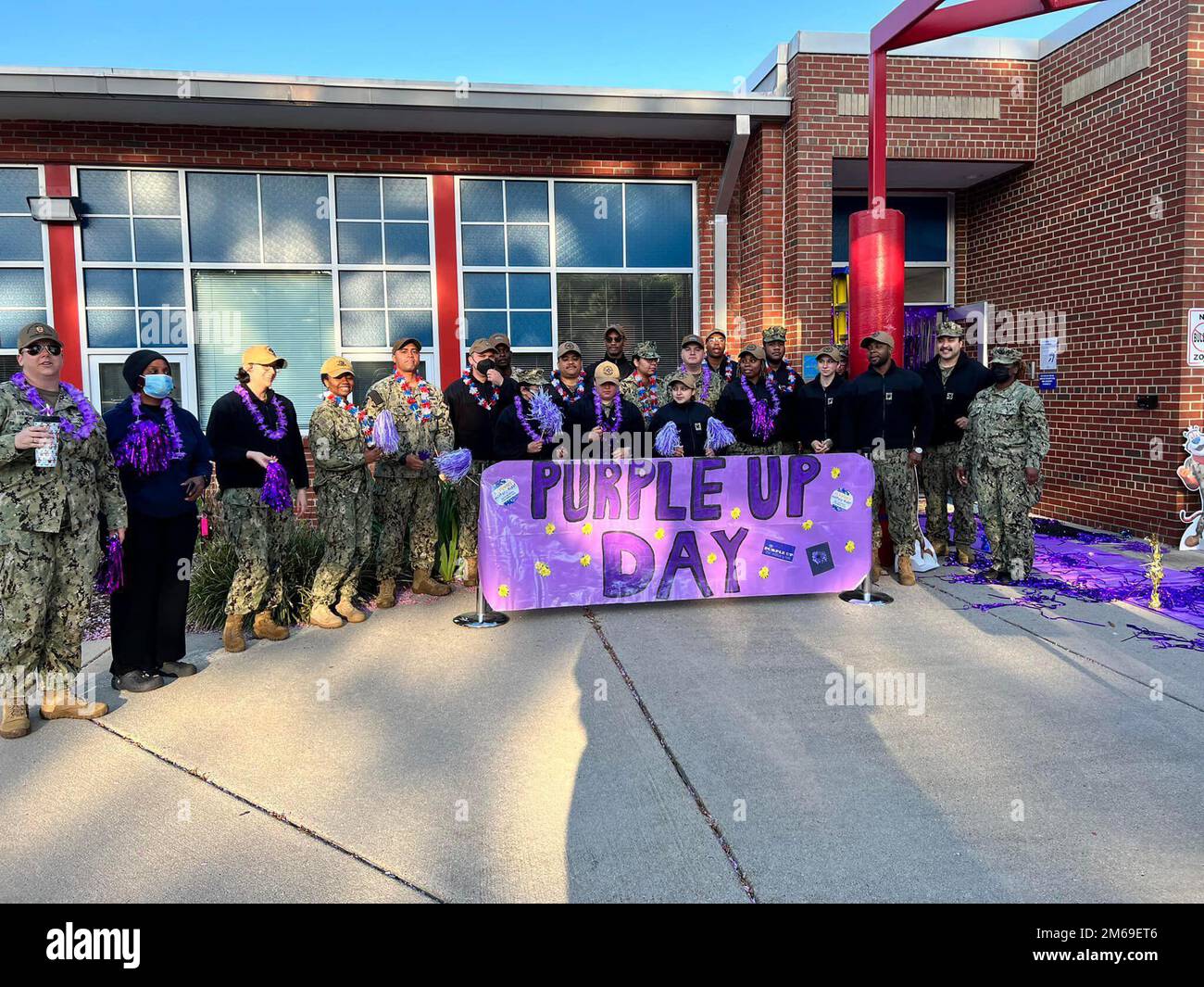 JEBLCFS celebrated Purple Up Day by cheering our military children into ...