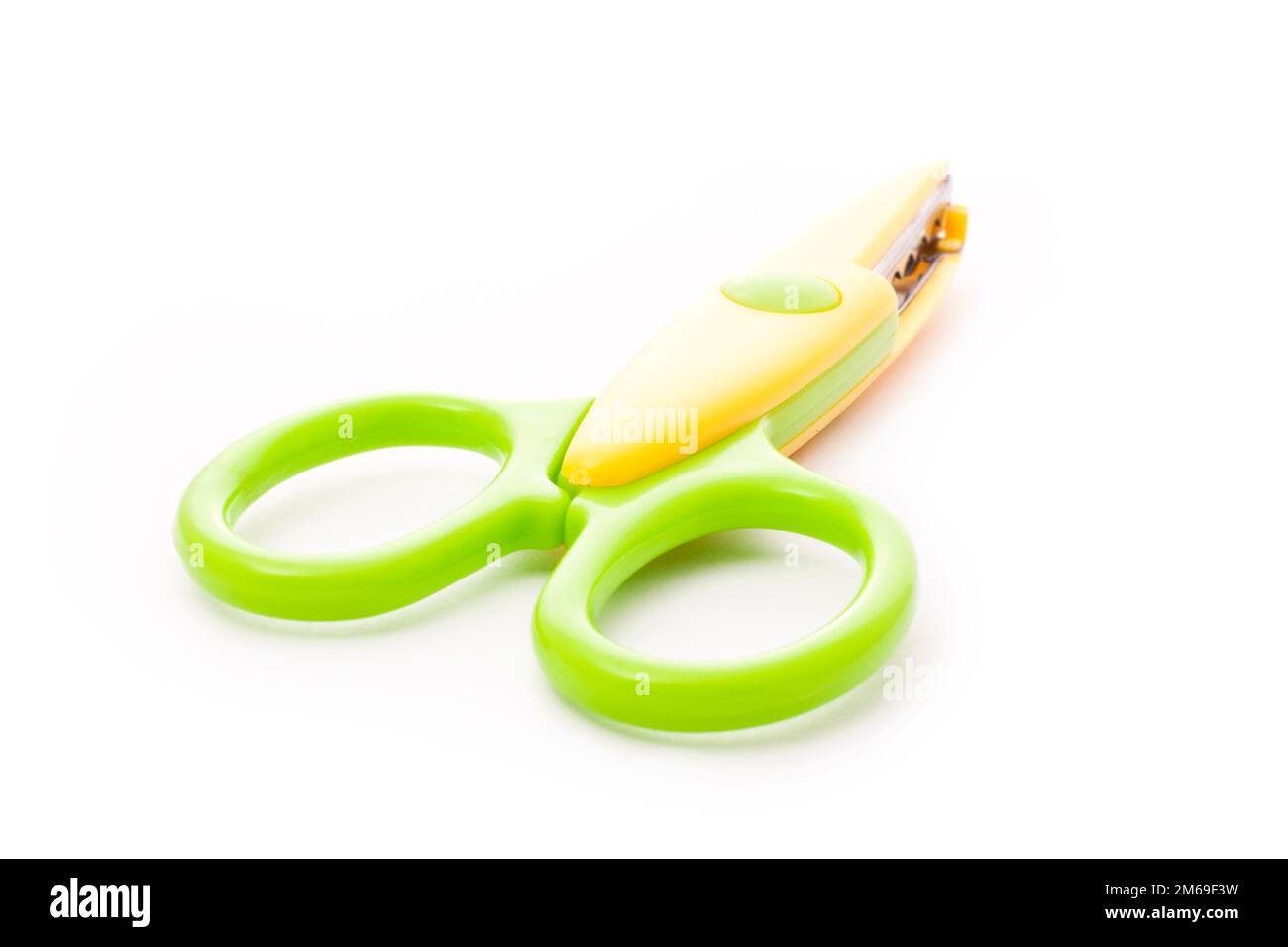 Green and yellow scissors Stock Photo - Alamy