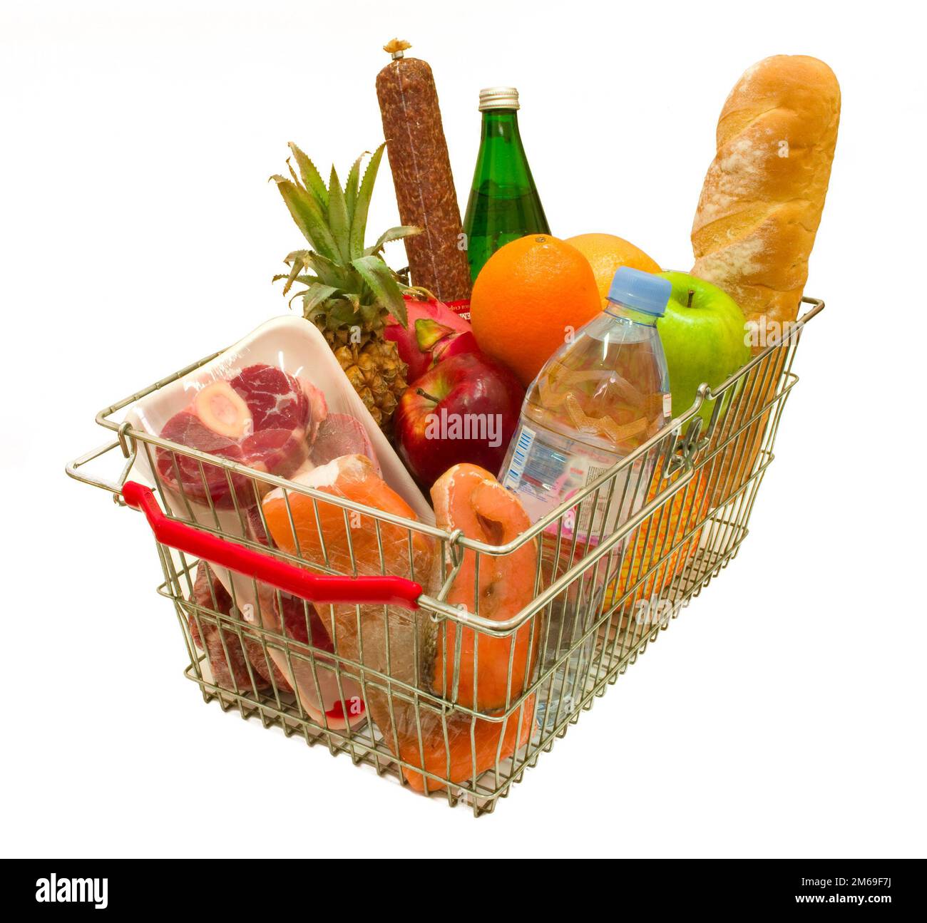 Cart and basket filled with grocery products hi-res stock photography ...