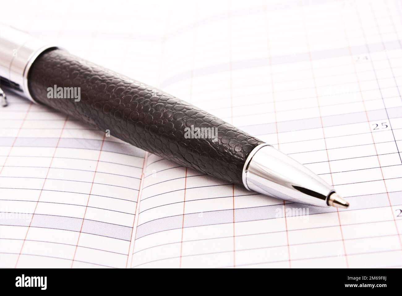 Notebook and a pen Stock Photo - Alamy