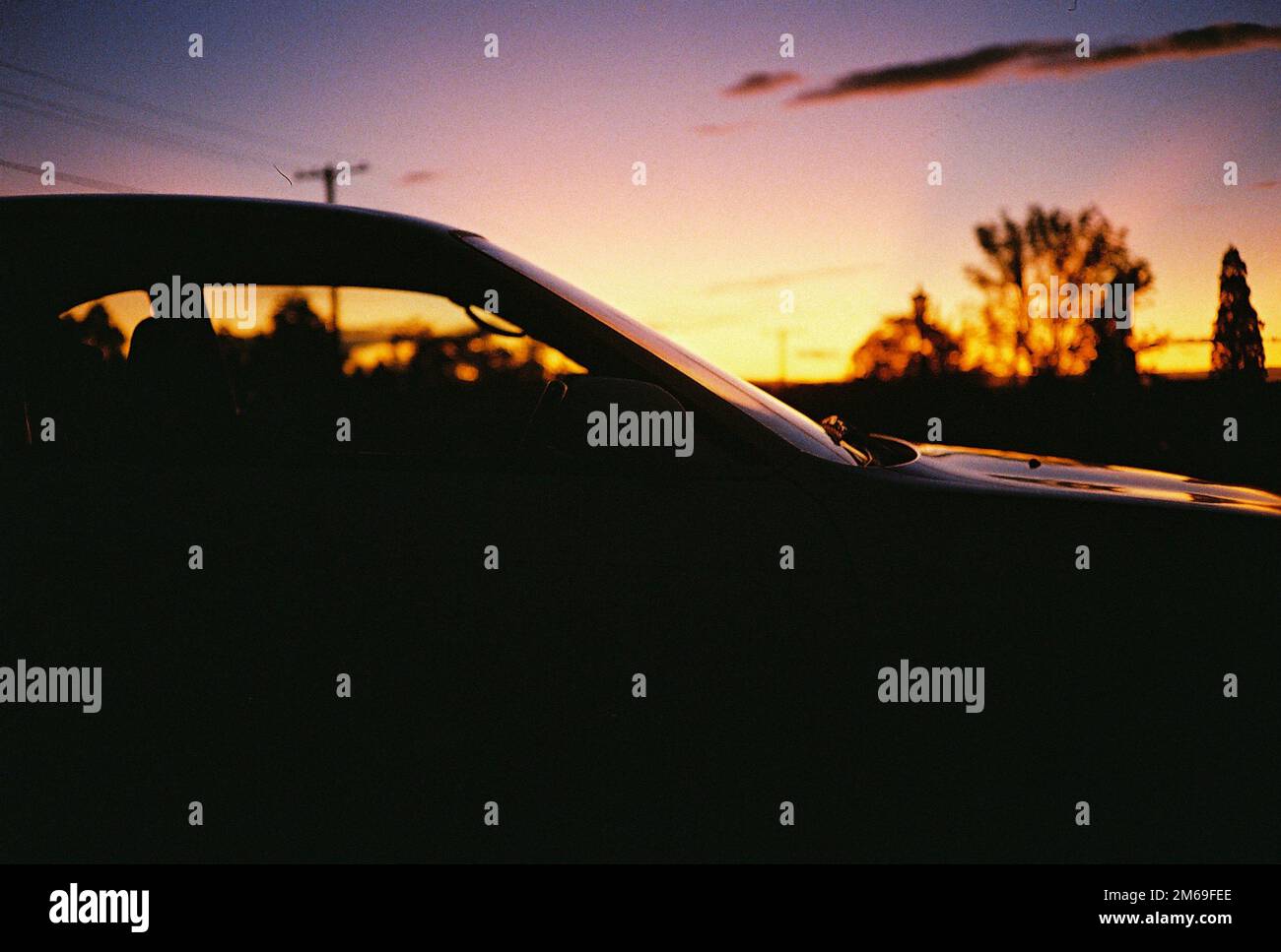 Sunset Behind car Stock Photo - Alamy