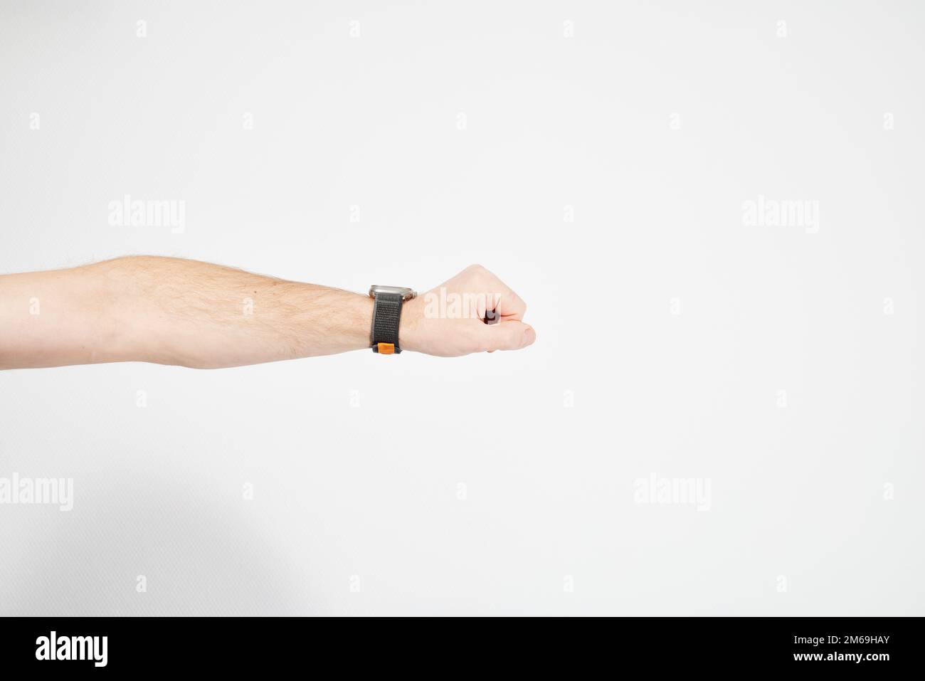 Man with suit and watch on hand hi-res stock photography and images - Alamy