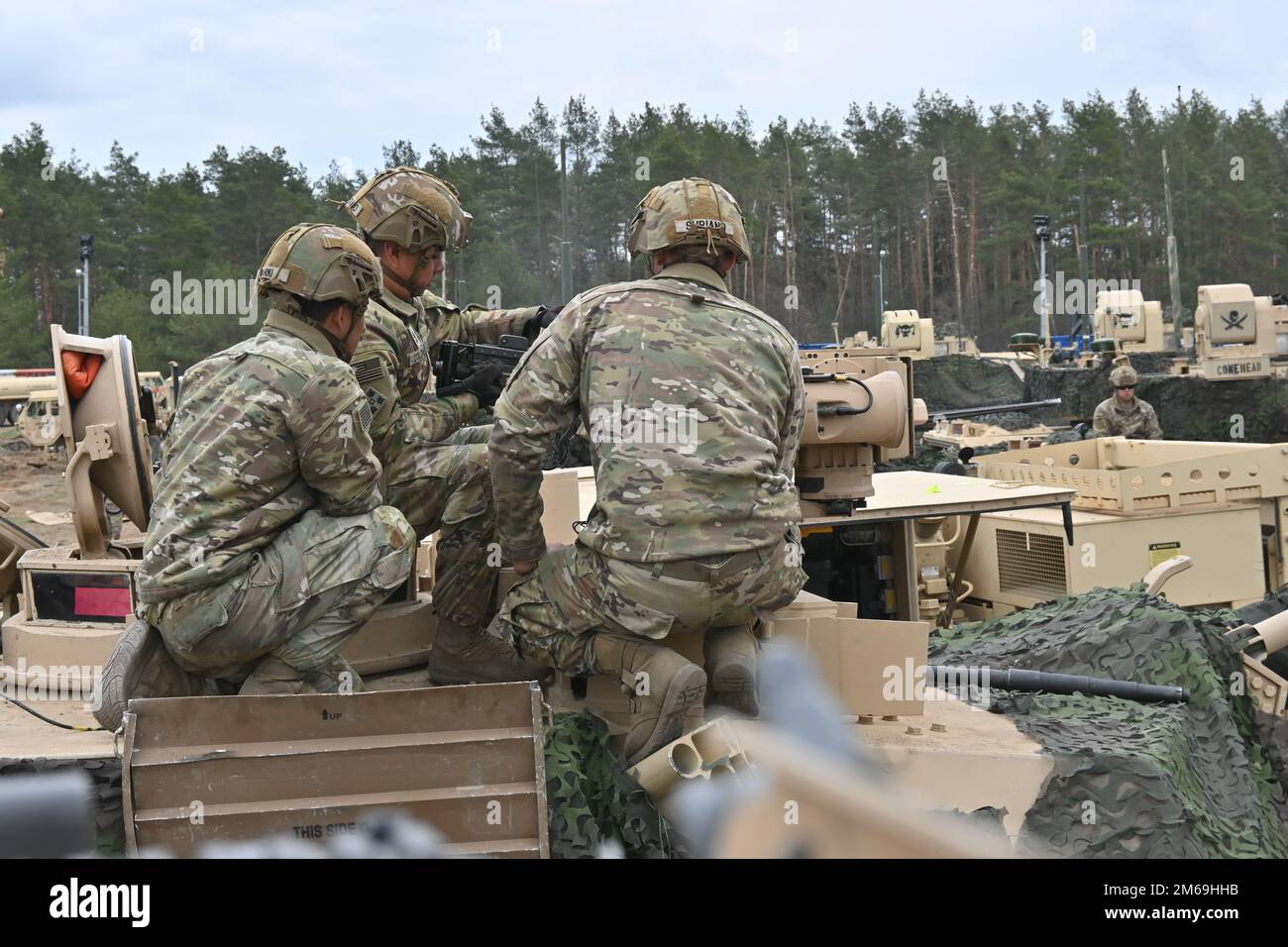 Pvt. 1st Class Mandip Karki (left), Sgt. 1st Class Levy Colorado (center), and Spc. Jacob ...