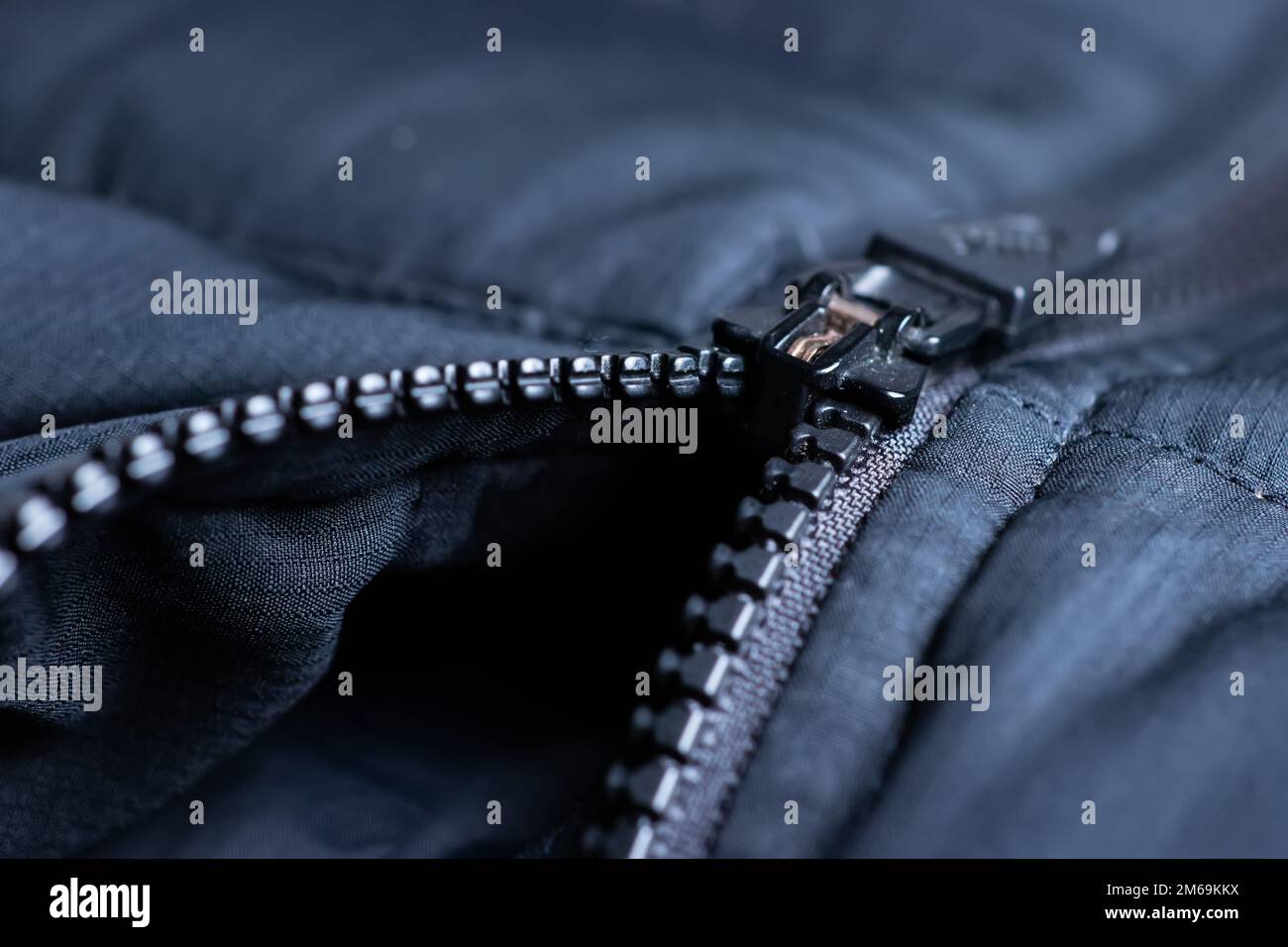 Iron zipper close up view, needlework concept Stock Photo - Alamy
