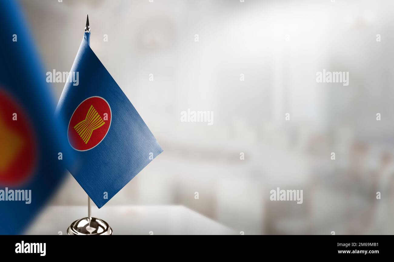 Small flags of the ASEAN on an abstract blurry background Stock Photo ...