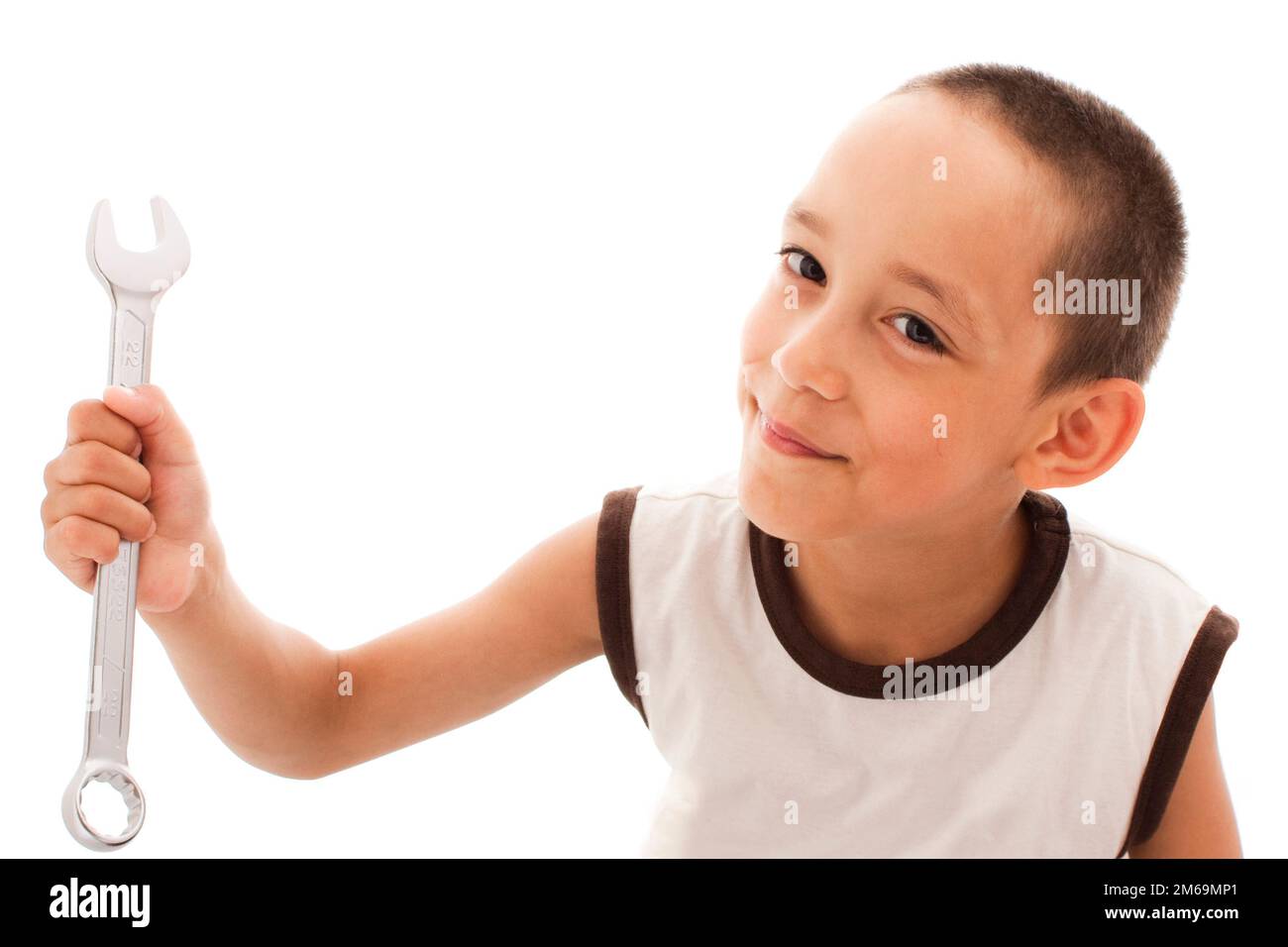 Boy holding spanner Stock Photo - Alamy