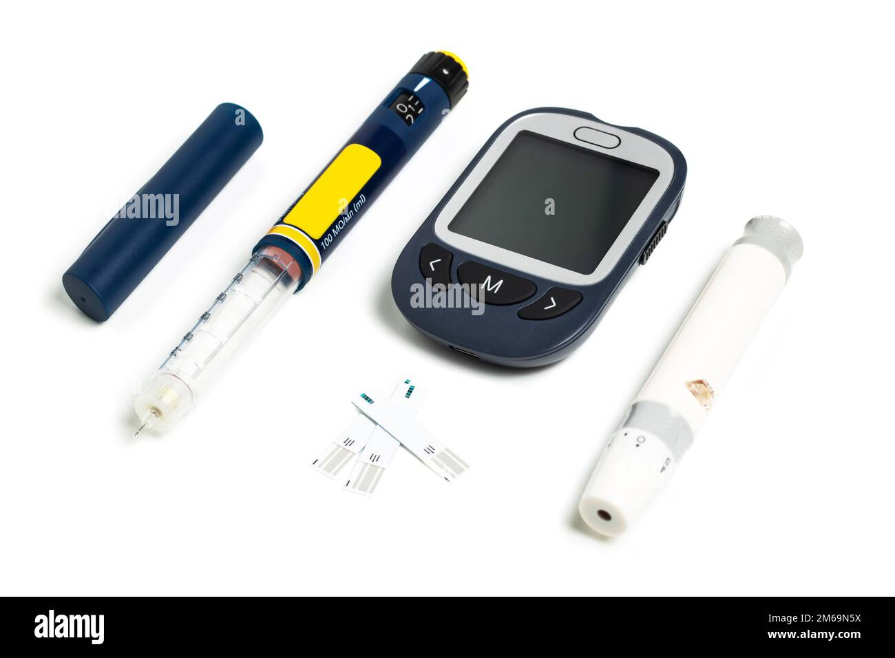 Measuring blood sugar. Glucometer with insulin pen on a white ...
