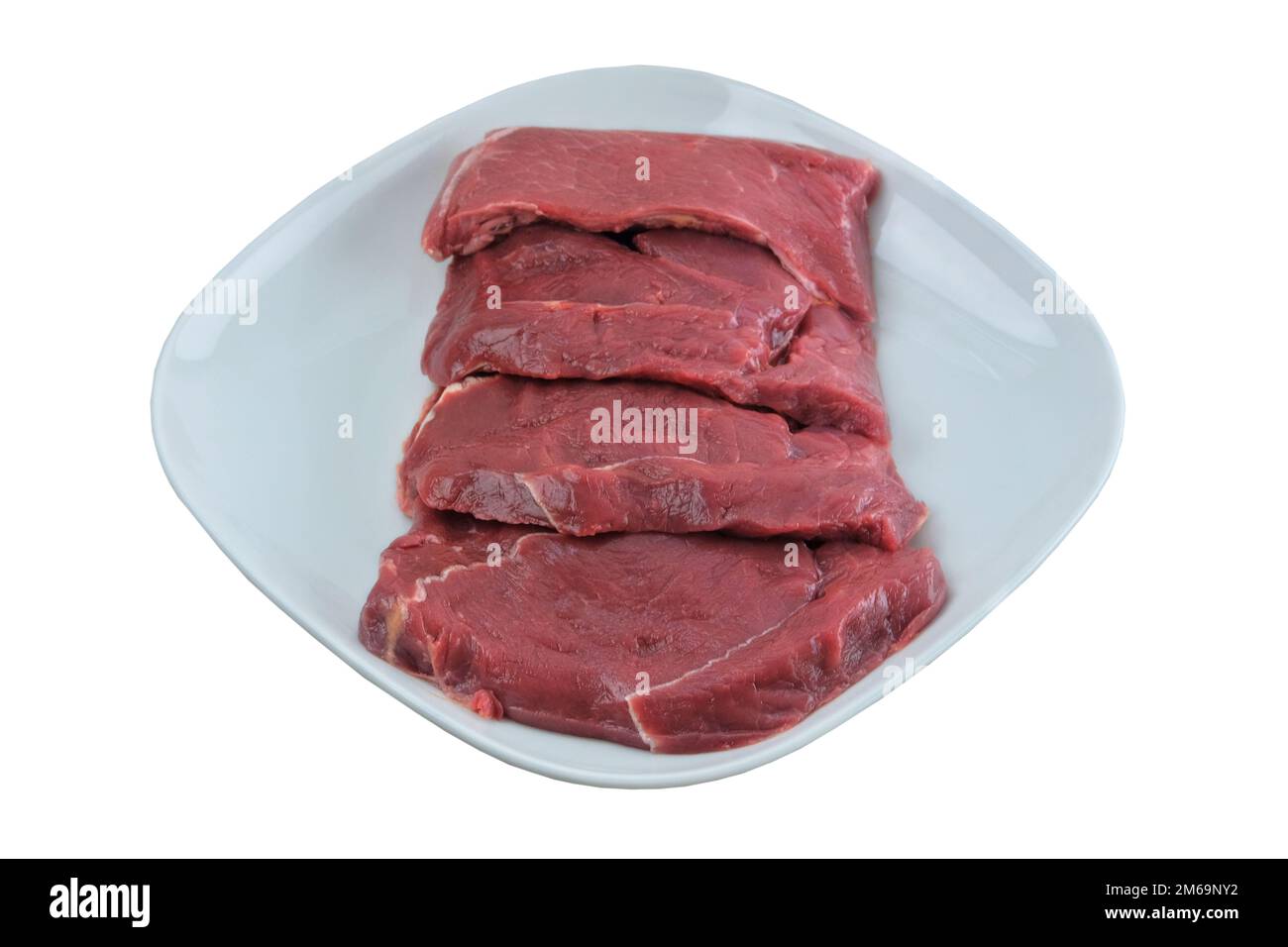 Beef steaks in plate isolated in white background. Raw meat for cooking ...