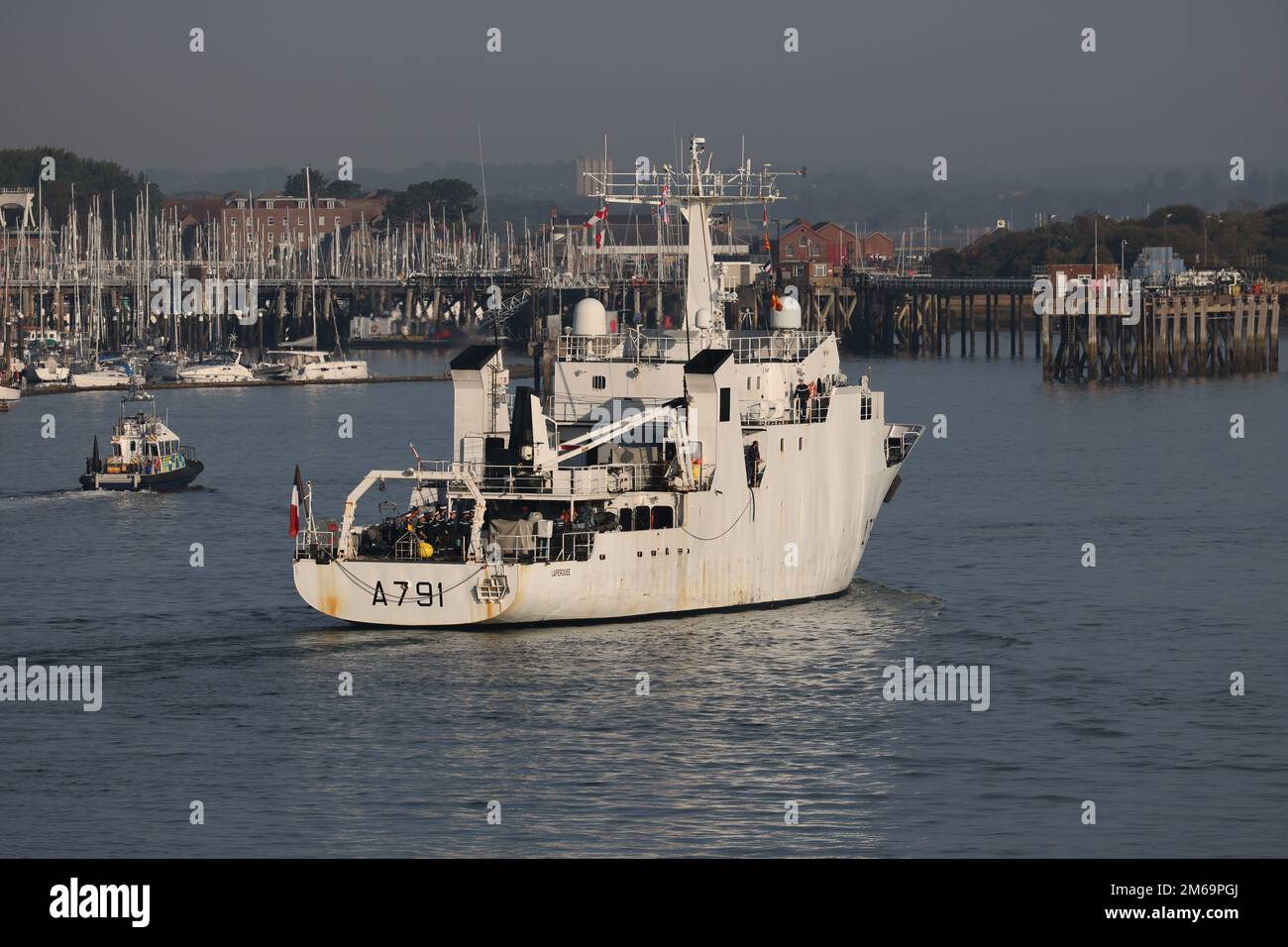 The French naval survey ship FS LAPEROUSE (A791) moves slowly towards a berth in the Naval Base ...