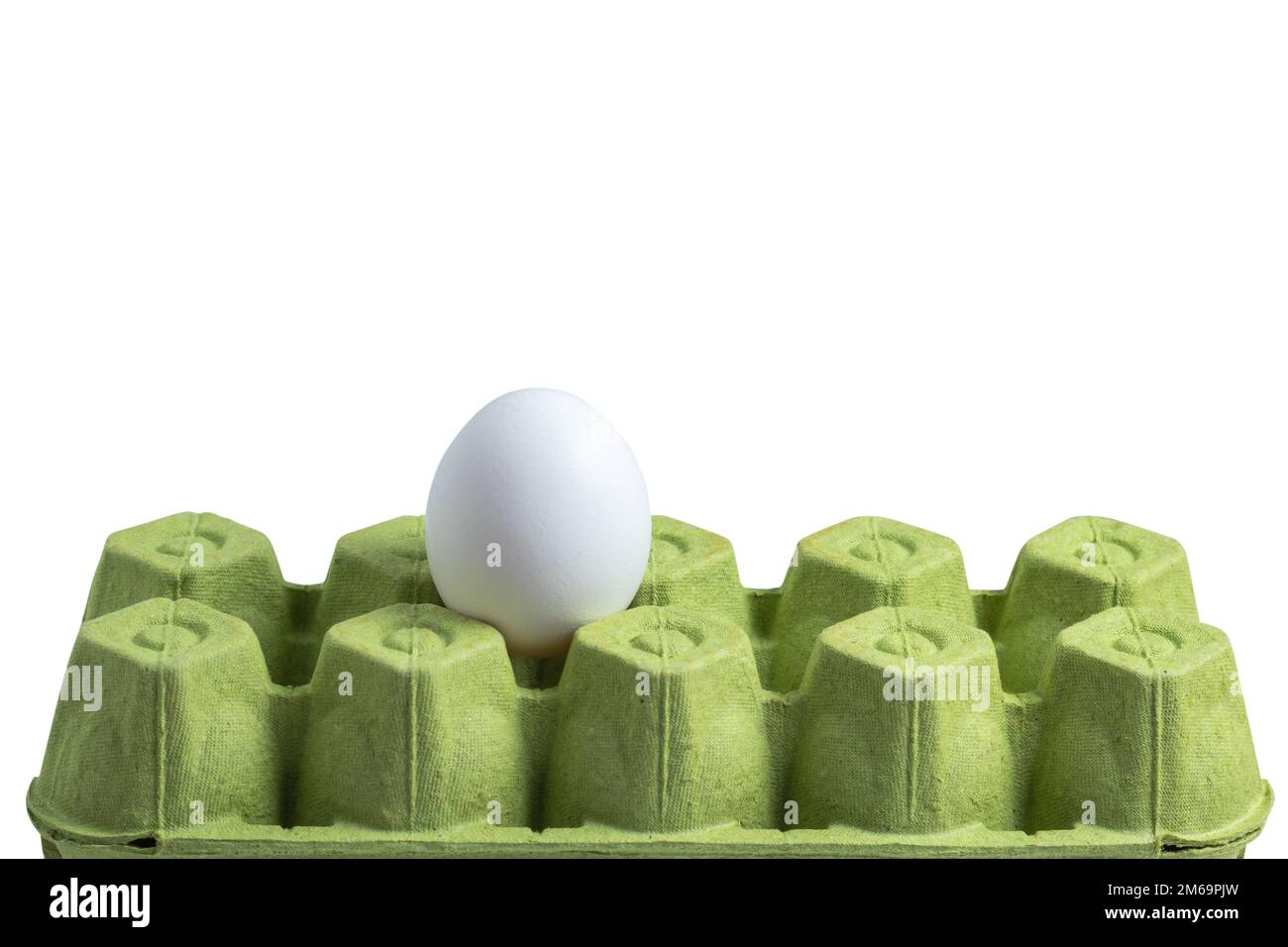 Single egg in paper egg tray on white background Stock Photo - Alamy