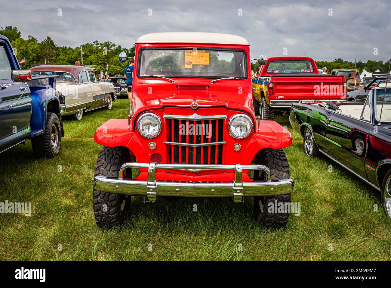 Iola, WI - July 07, 2022: High perspective front view of a 1962 Willys ... Iola, WI - July 07, 2022: High perspective front view of a 1962 Willys ...