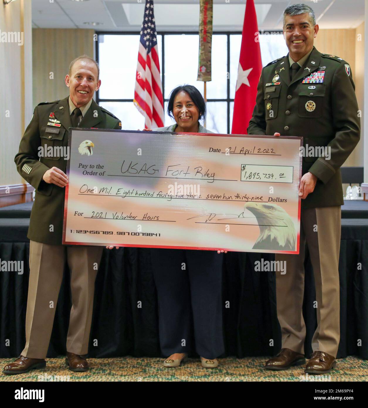 Monica Basset (center), the Fort Riley 2021-2022 Installation Volunteer ...