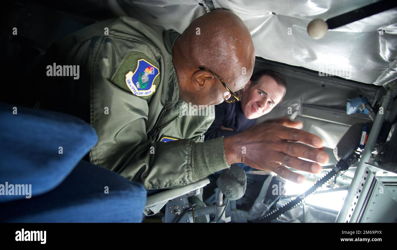 Boom operator Chief Master Sgt. Patrick Ogle shows honorary commander ...