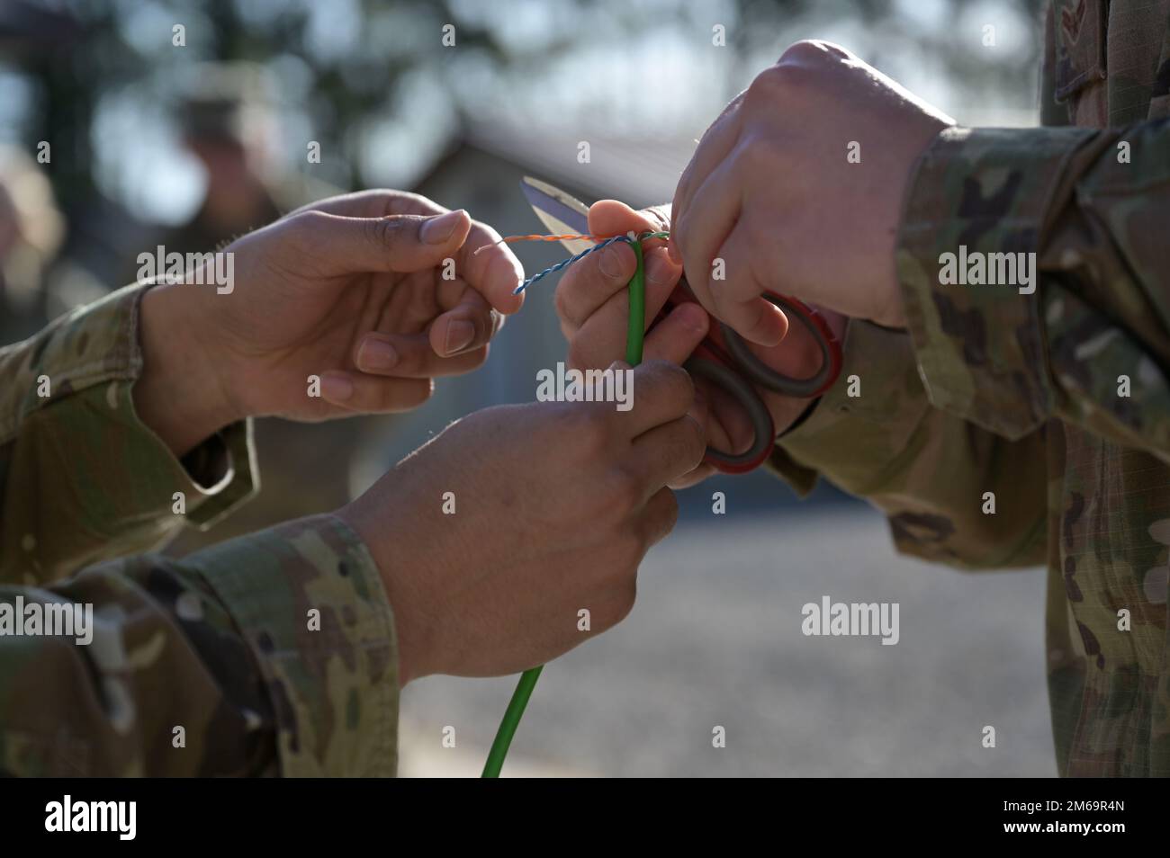 U.S. Air Force Staff Sgt. Zion Jackson, left, and Airman 1st Class Chad ...