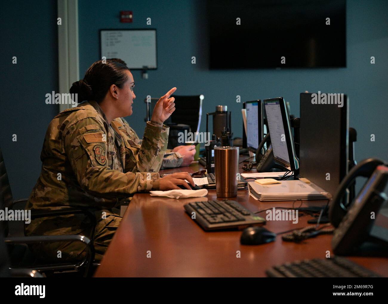 U.S. Air Force Airmen working at the Deployment Control Center oversea a pre-deployment exercise ...