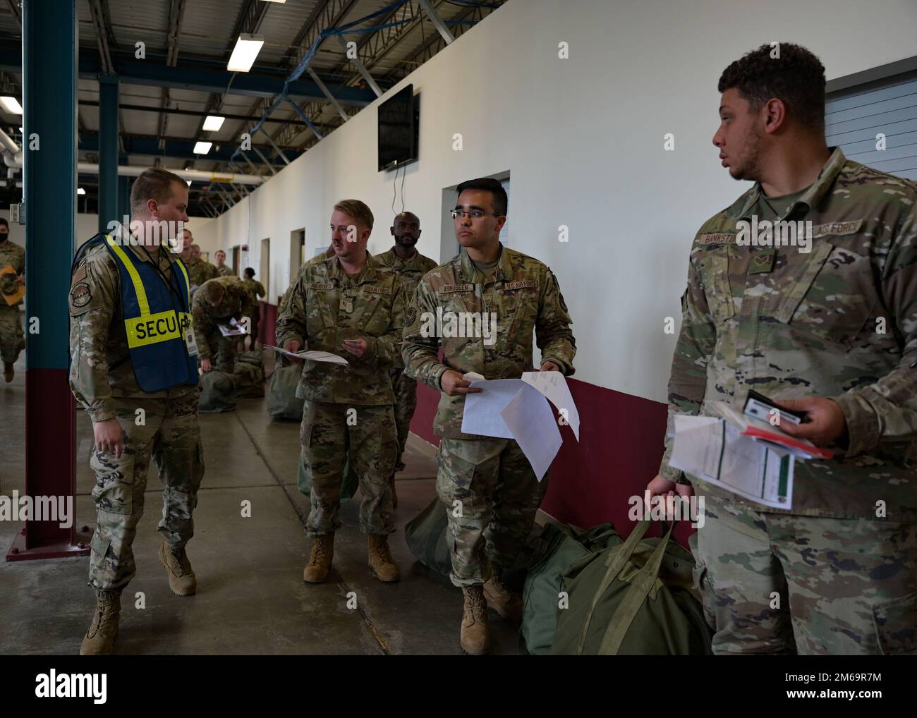 Airmen prepare to go through a Pre-Deployment Flight line during a ...