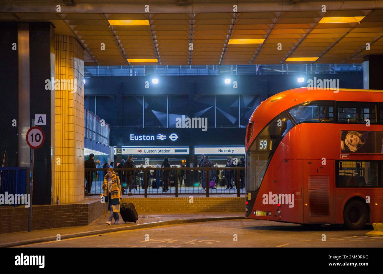 Euston Station London with Red Bus and passengers Stock Photo - Alamy
