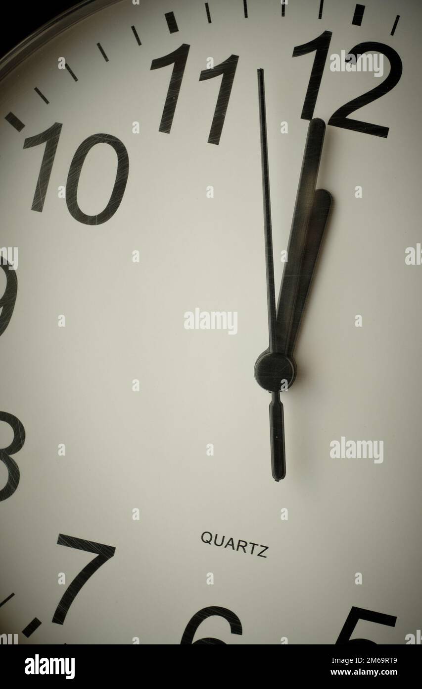 Clock Near Twelve Stock Photo - Alamy
