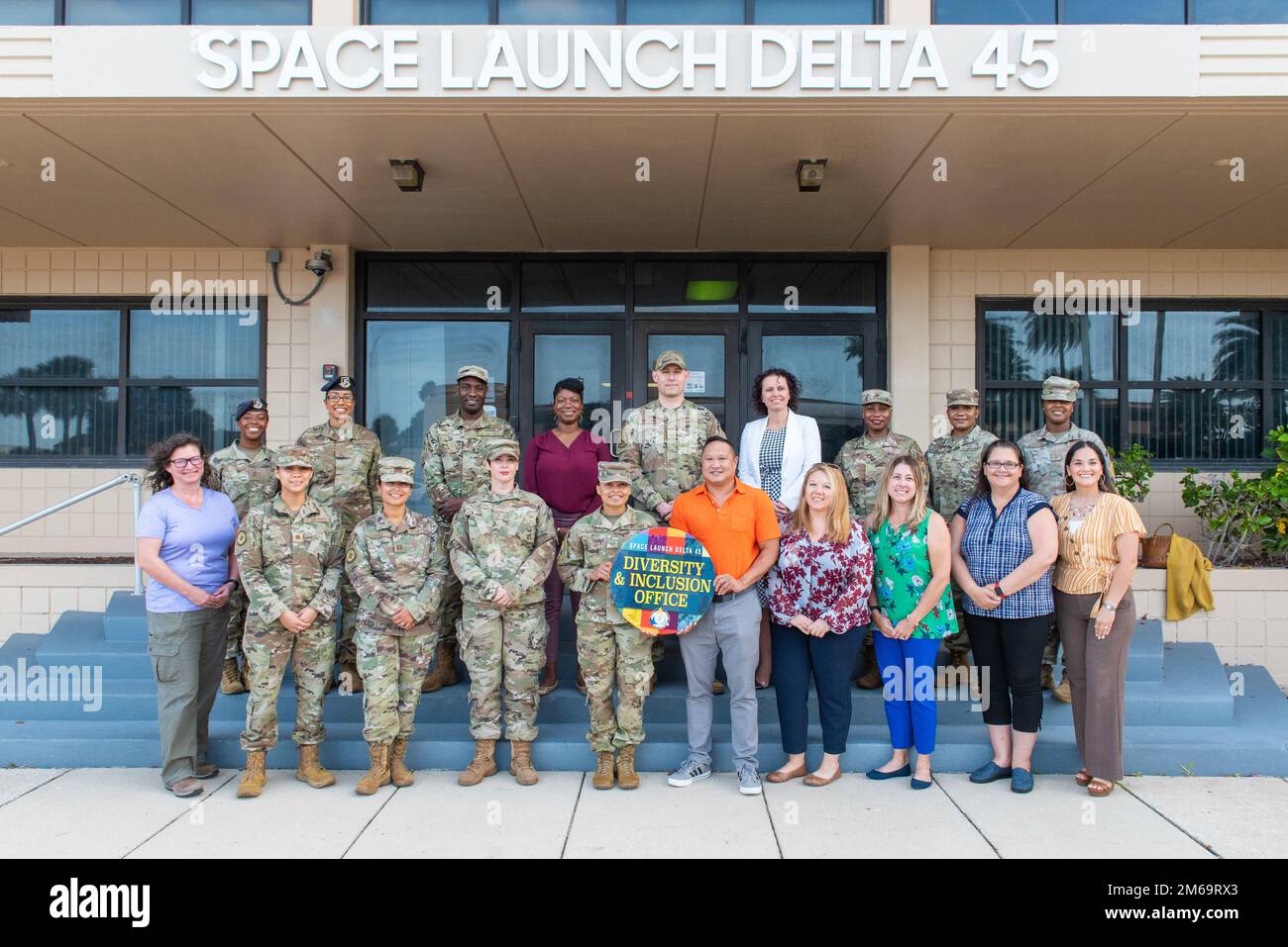 The Space Launch Delta 45 Diversity & Inclusion office poses for a ...