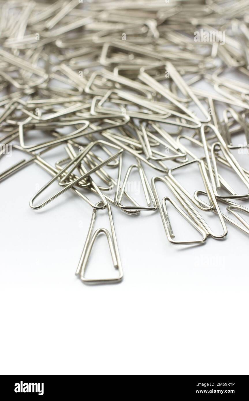 Steel clips closeup isolated on white background Stock Photo - Alamy