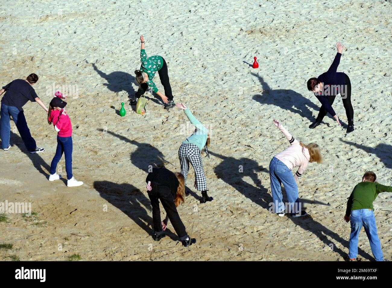 ODESA, UKRAINE - JANUARY 2, 2022 - People exercise on the beach in ...