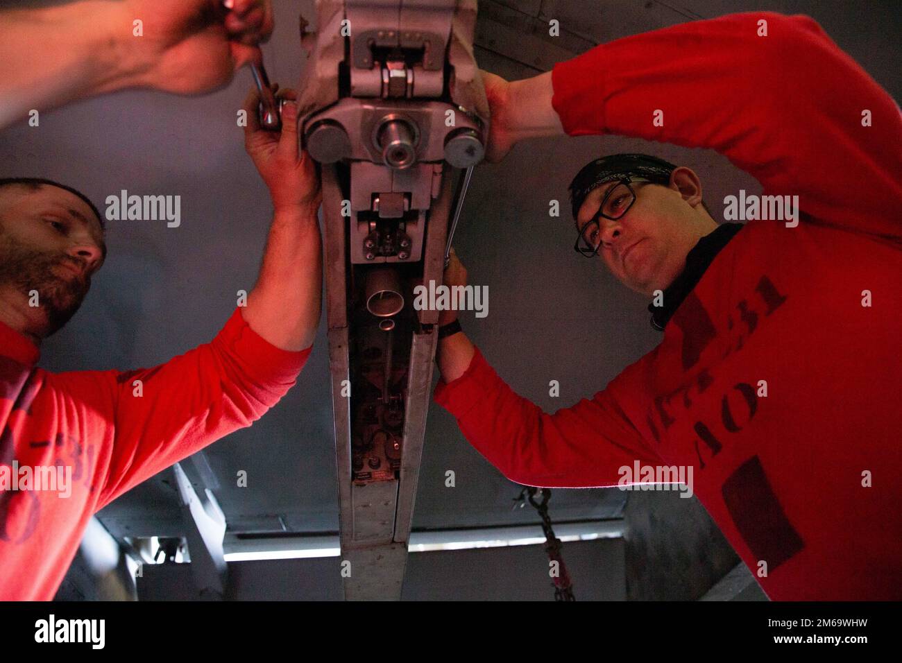 Aviation Ordnanceman 1st Class Caleb Cochran, left, from St. Charles ...