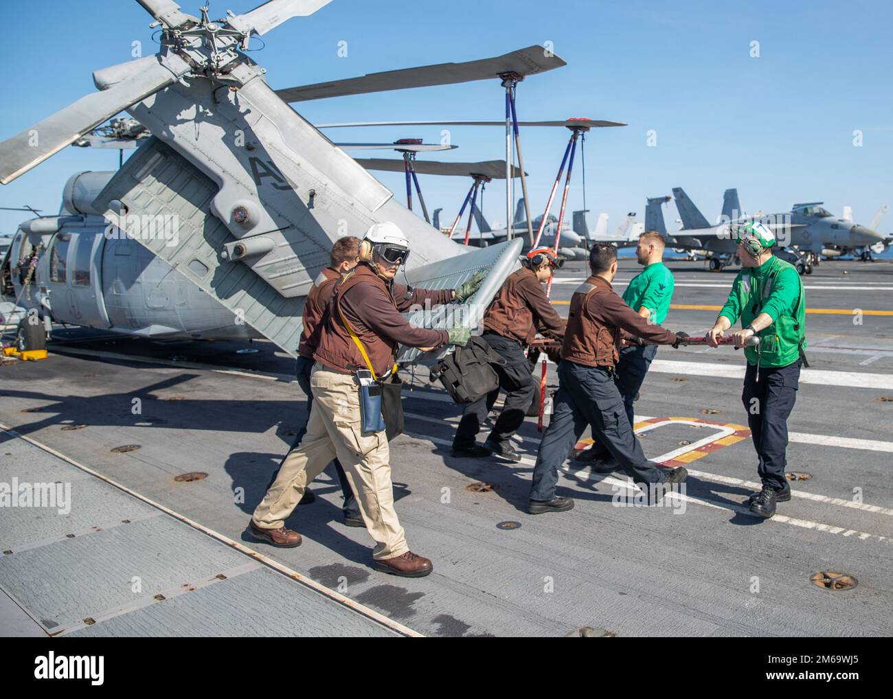 Sailors assigned to the "Tridents" of Helicopter Sea Combat Squadron ...