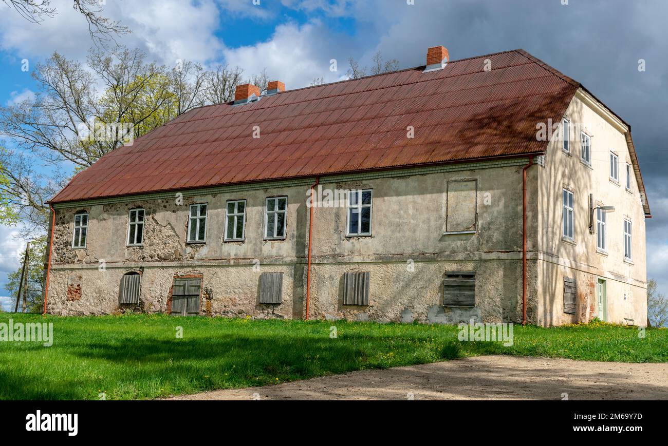 spring landscape with a beautiful stone building, Sunday school house ...