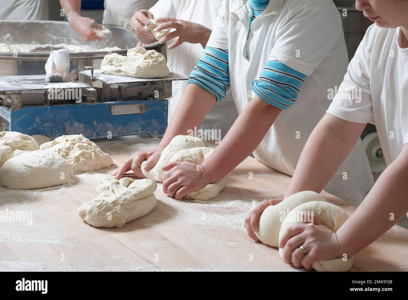 Working bakery team Stock Photo - Alamy