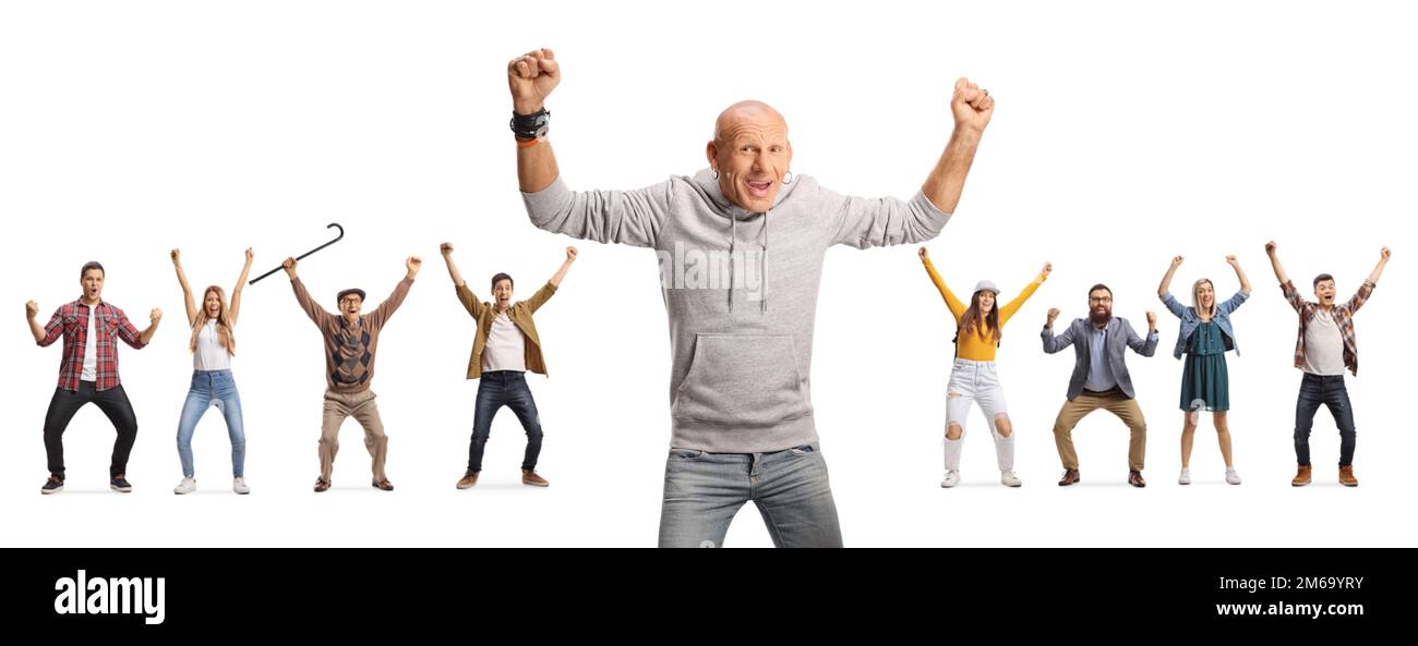Bald man gesturing happiness and group of people cheering in the back ...