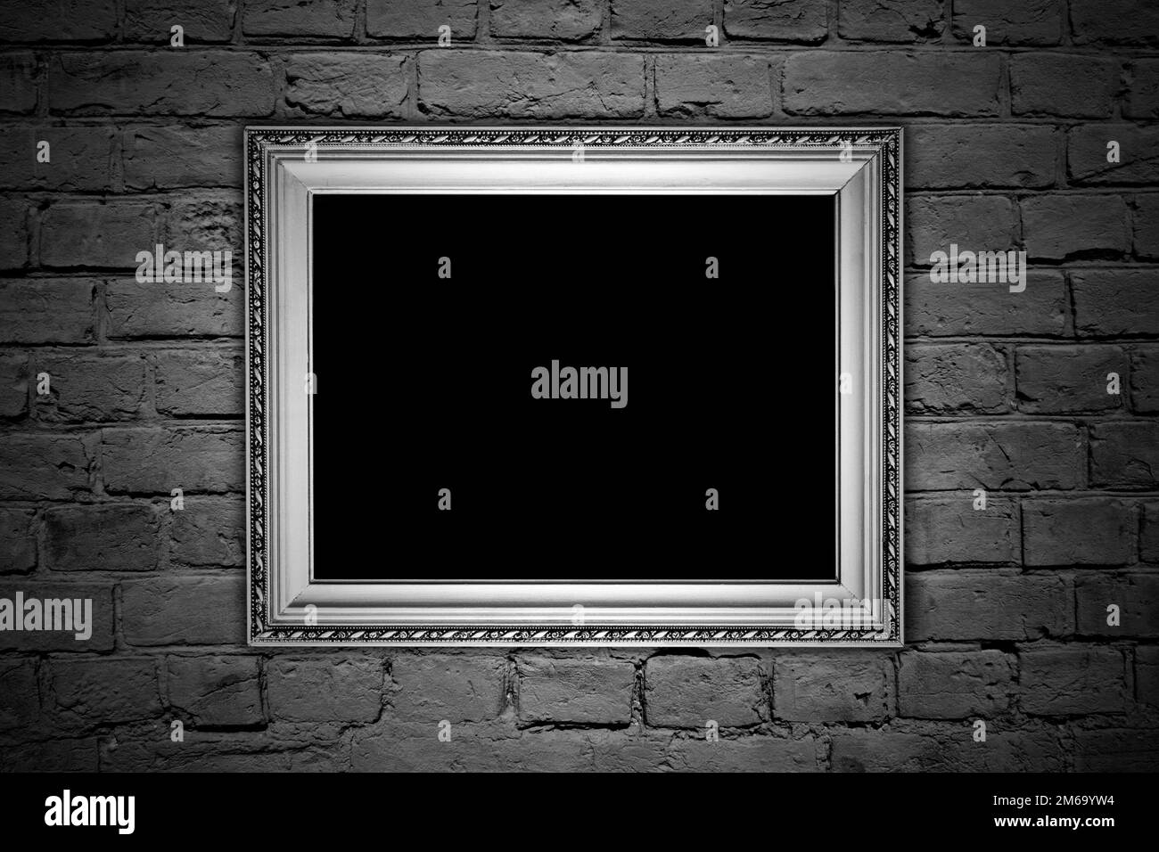 Brick wall with a frame Stock Photo - Alamy