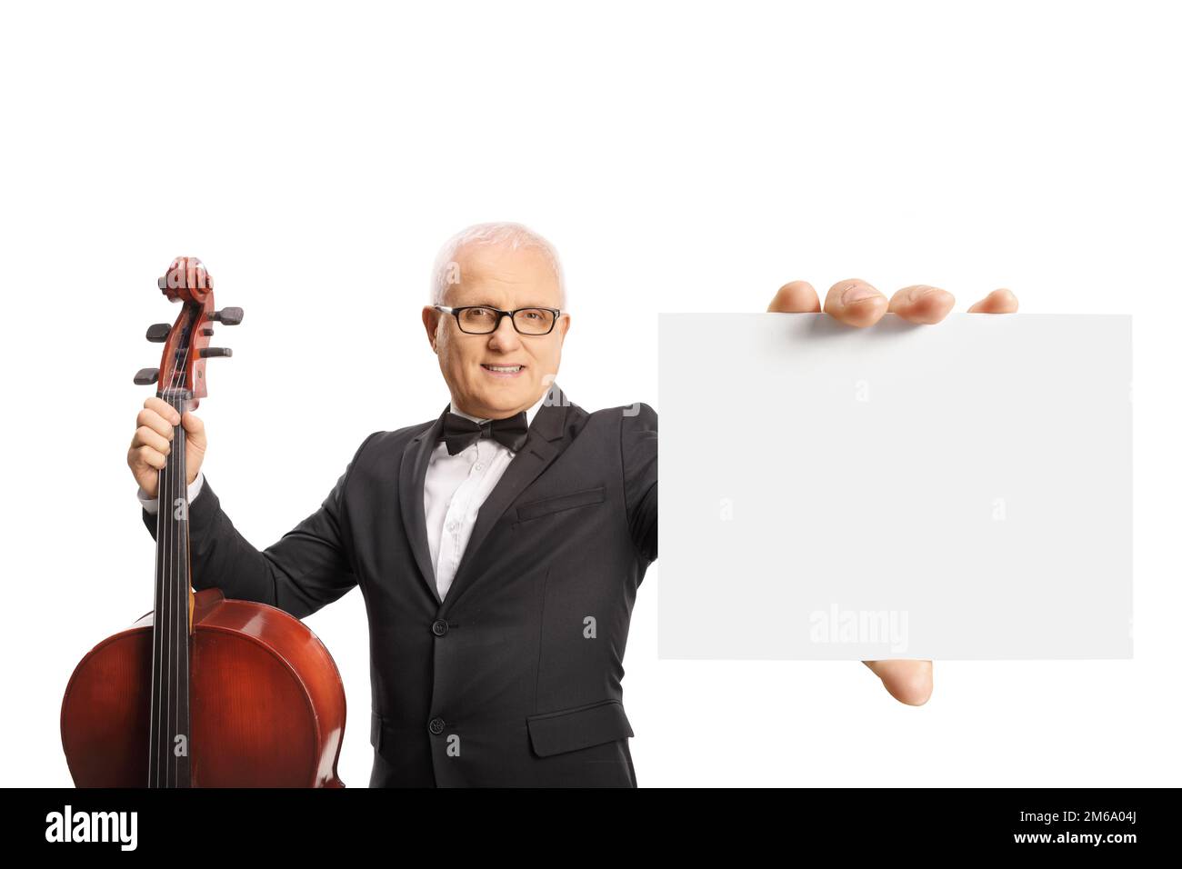 Elegant man with cello holding a blank cardboard isolated on white ...