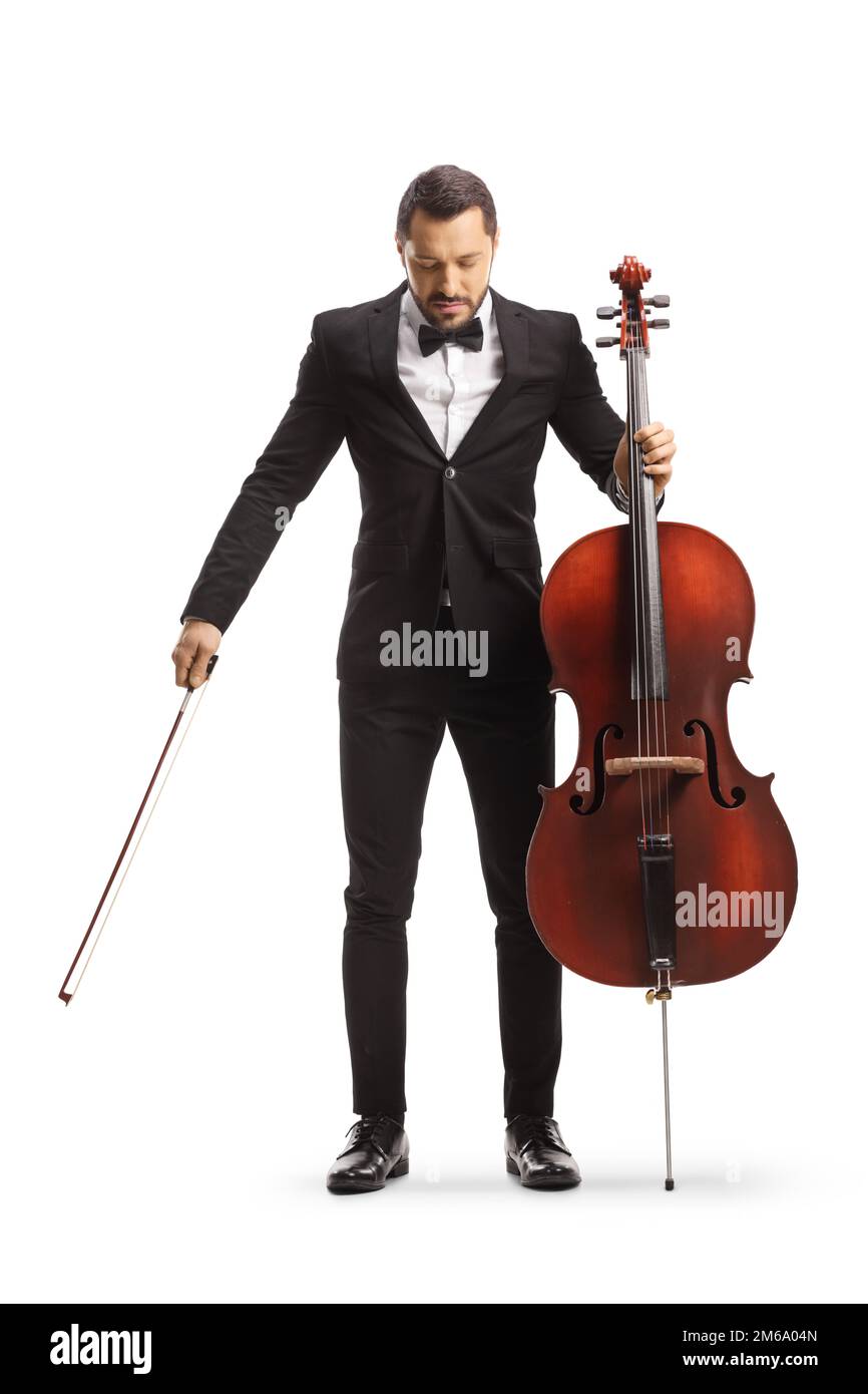 Full length portrait of a musician holding a cello and bowing isolated ...
