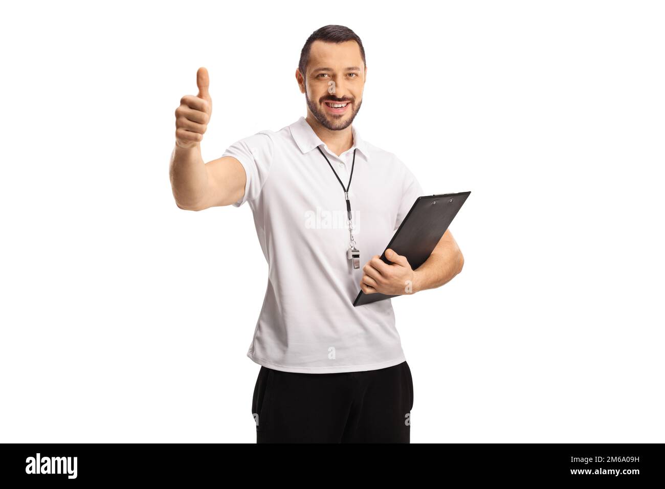 Male sports coach gesturing thumbs up isolated on white background ...